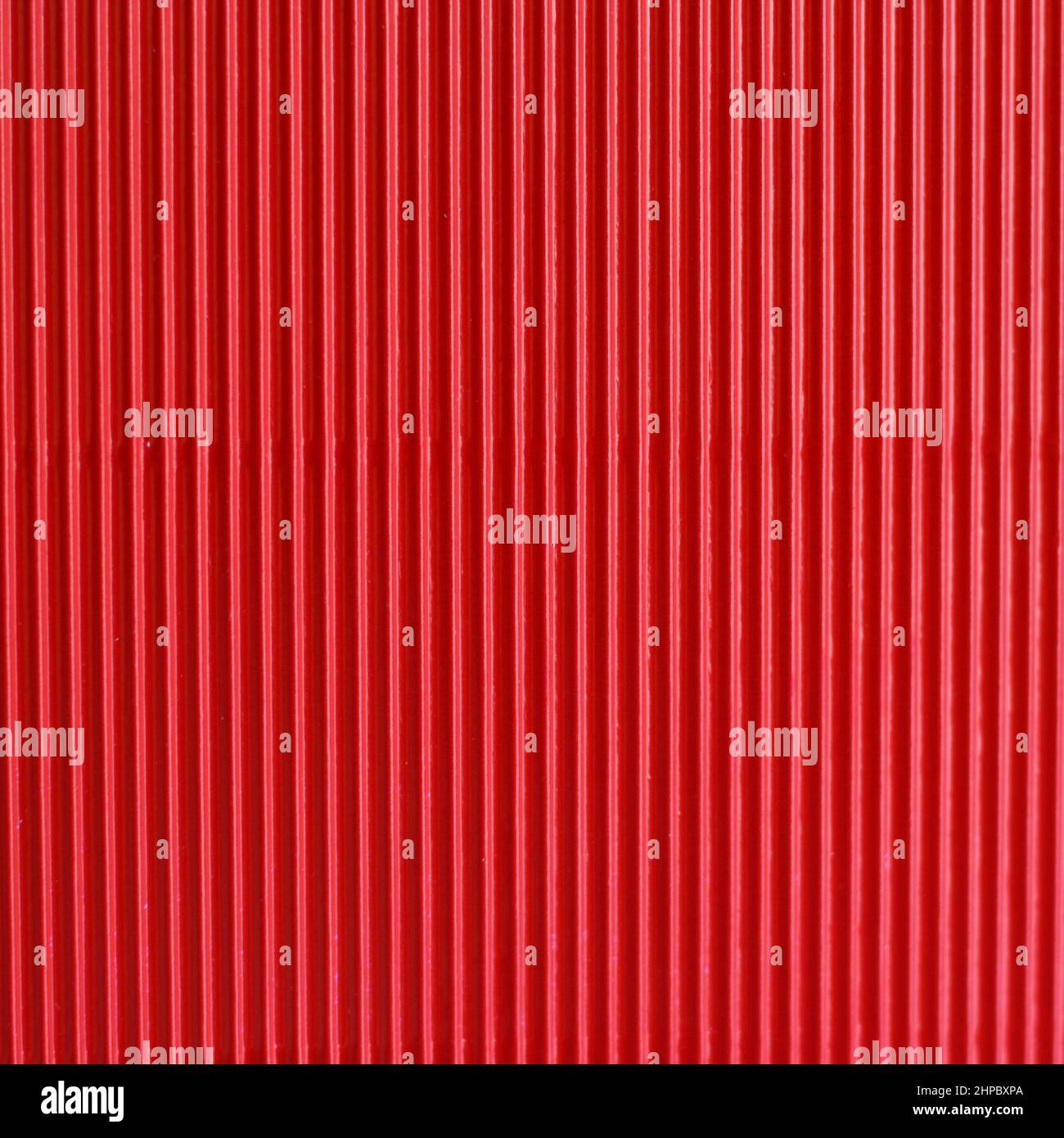 A piece of red vertical channeled background Stock Photo - Alamy