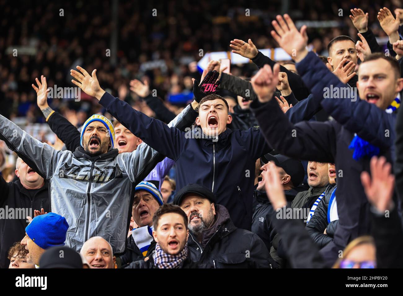 Leeds United fans sing during the game Stock Photo - Alamy