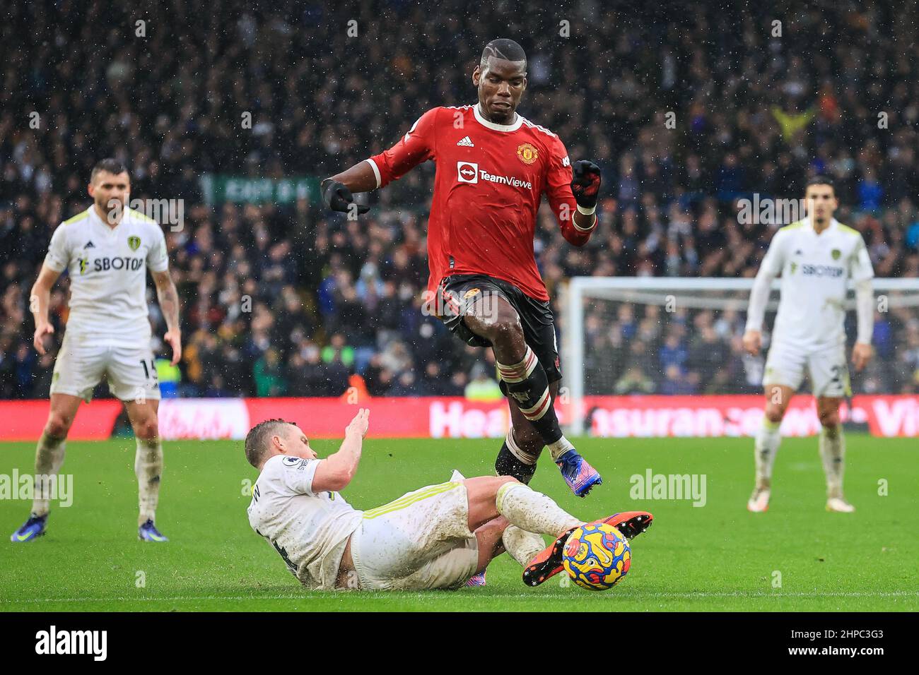 Paul Pogba #6 of Manchester United is tackled by Adam Forshaw #4 of ...
