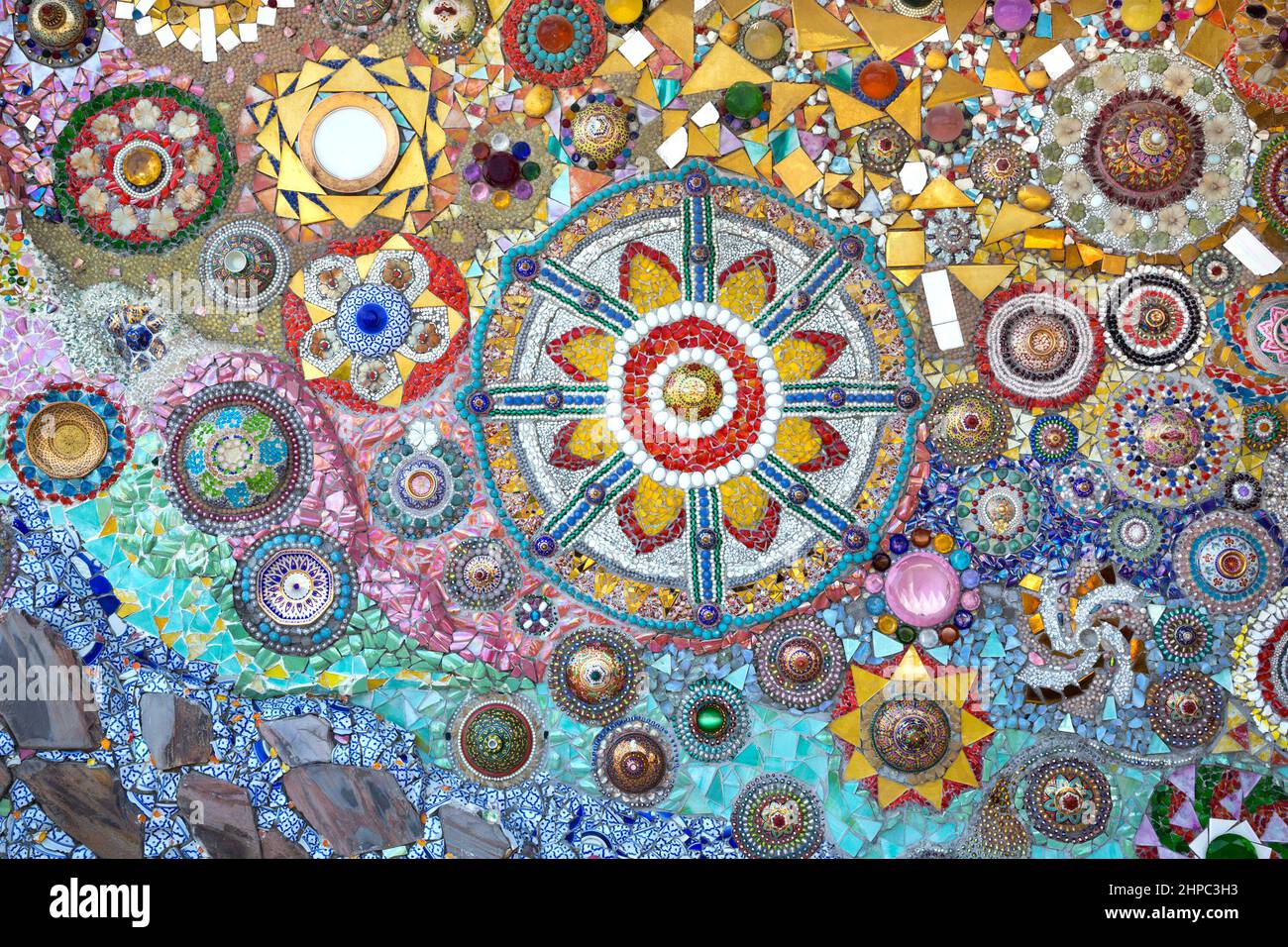 The pattern of the wall is decorated with small pieces of ceramic Stock ...