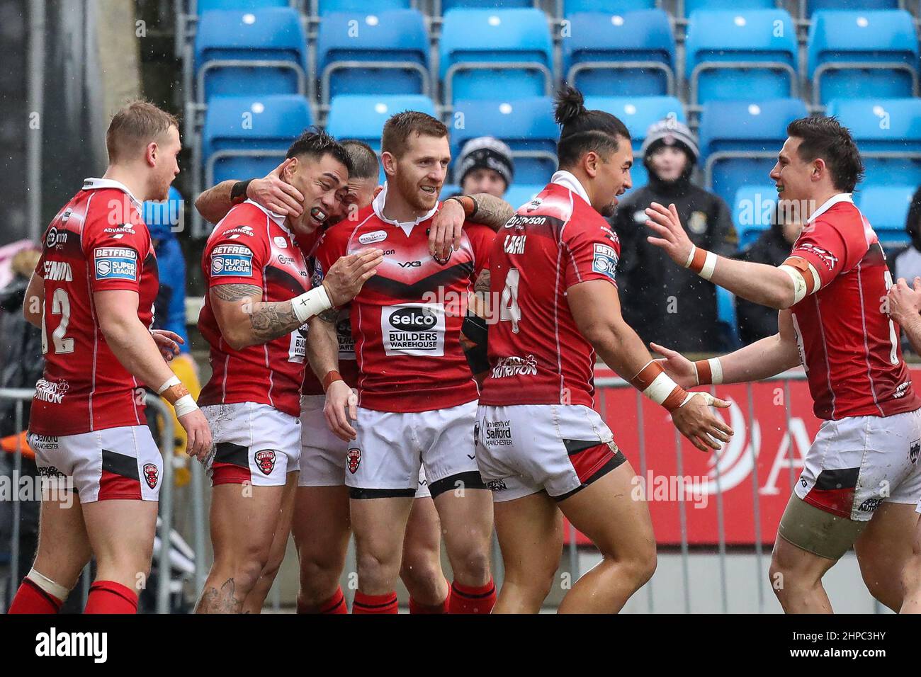 Ken Sio #2 of Salford Red Devils celebrates his try and opens the score ...