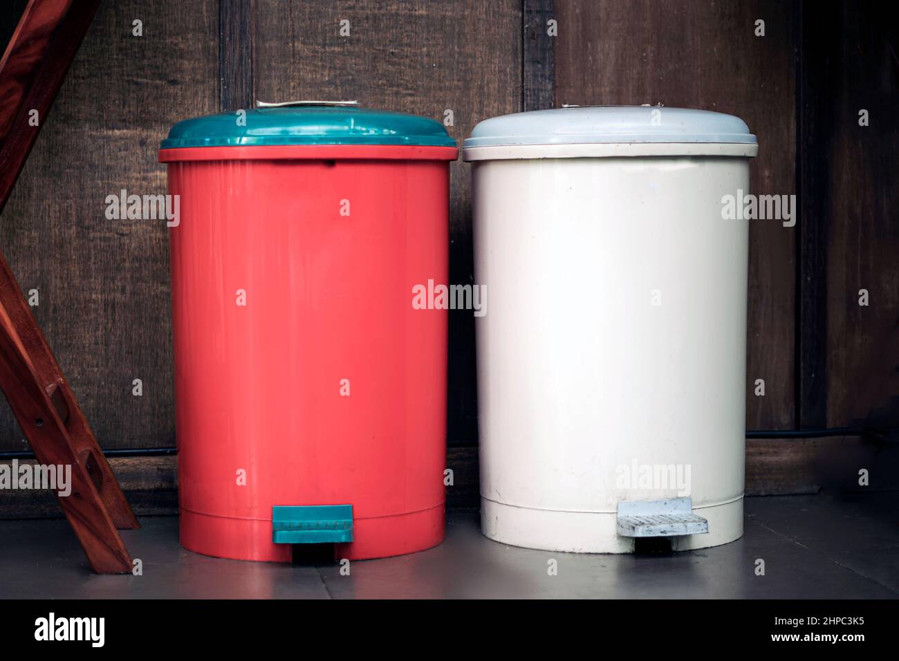 white and red trash basket, separate garbage, different baskets for ...