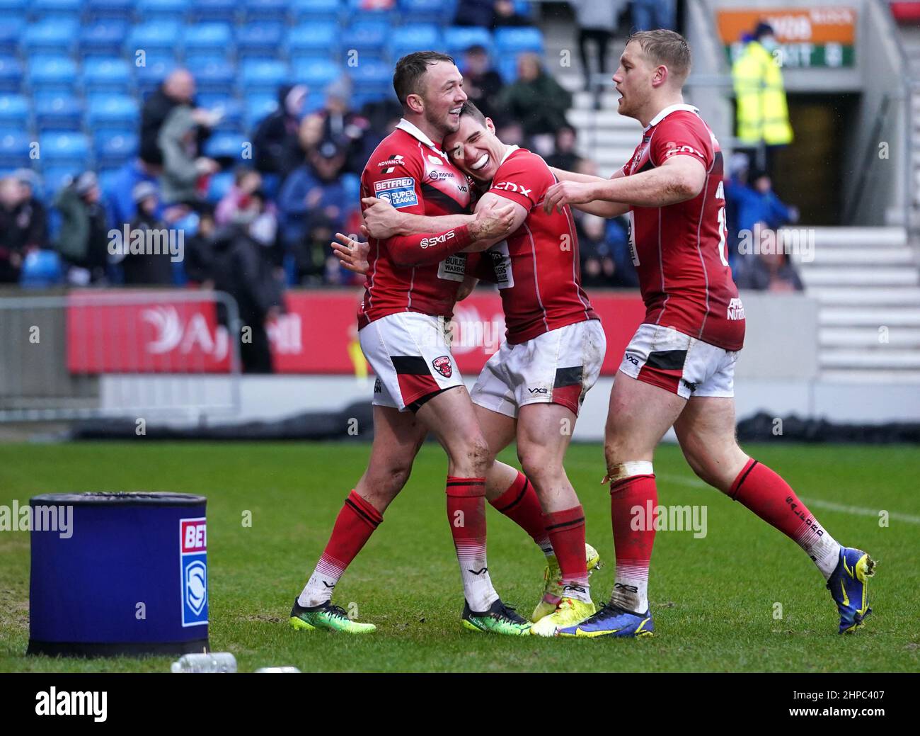Salford Red Devils' Ryan Brierly (left) celebrates scoring their side's ...