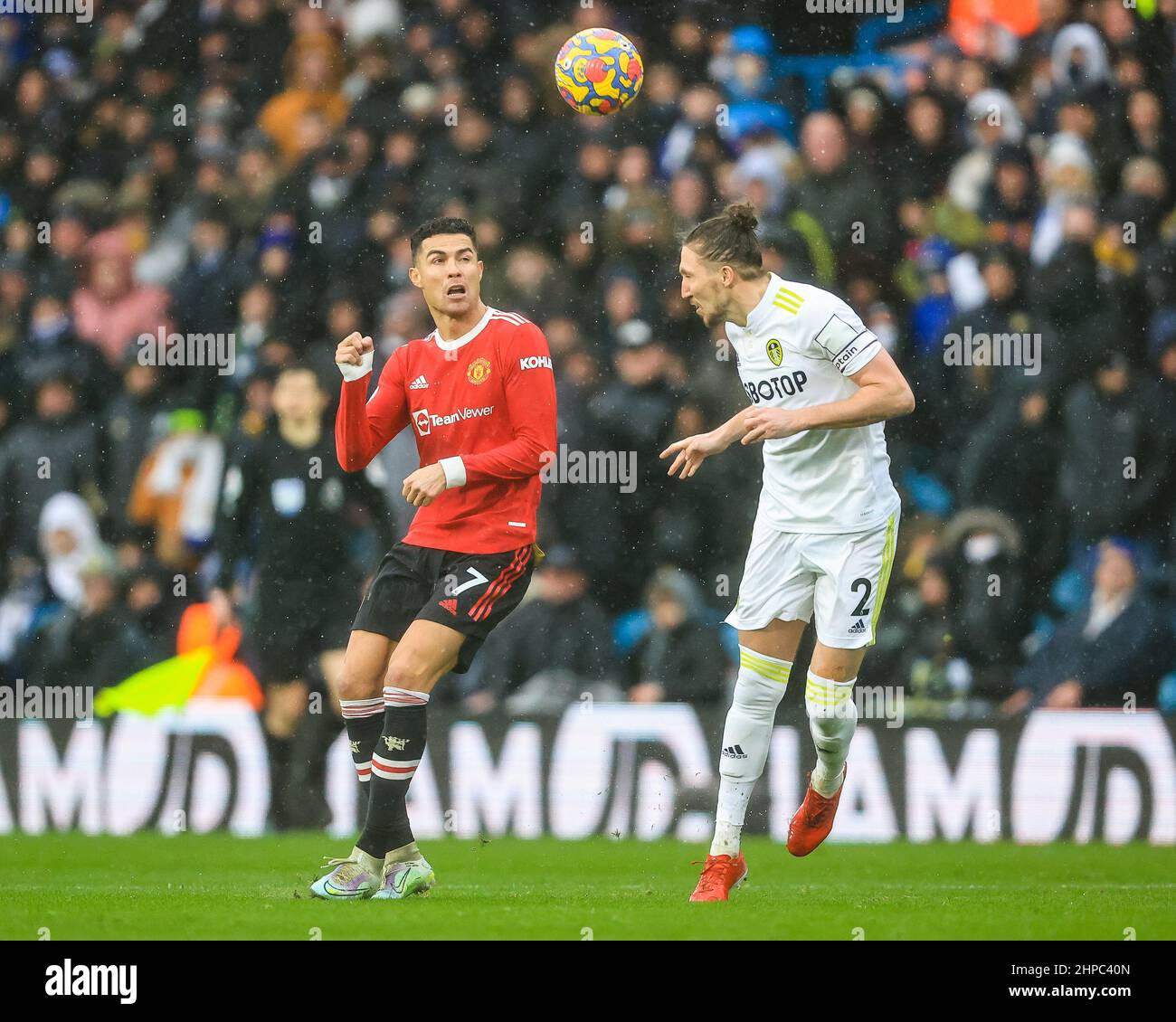 Luke Ayling #2 of Leeds United wins the header in , on 2/20/2022 ...