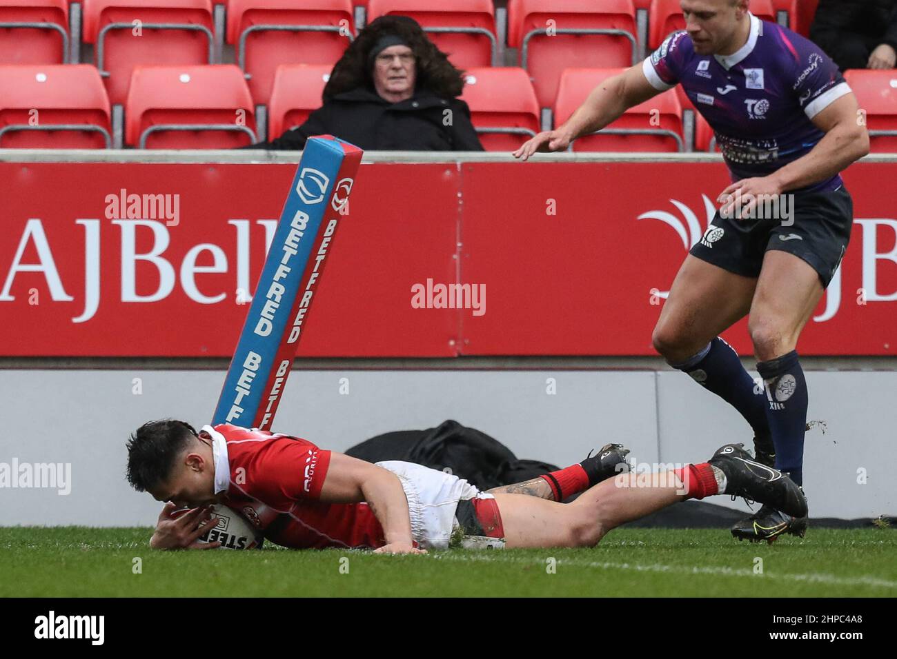 Ken Sio #2 of Salford Red Devils goes over for his second try of the ...