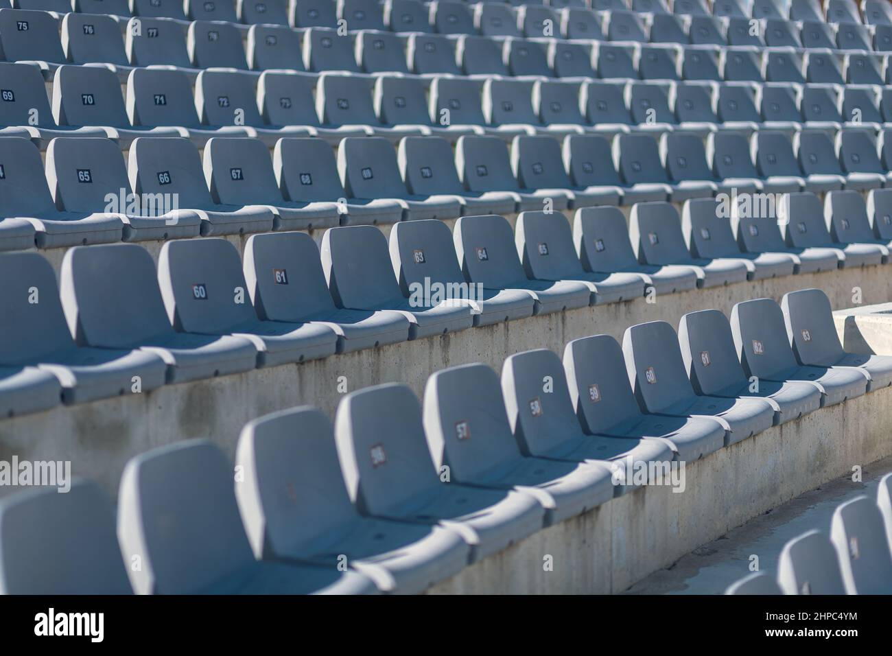 Modern outdoor amphitheater with rows of gray chairs Stock Photo - Alamy