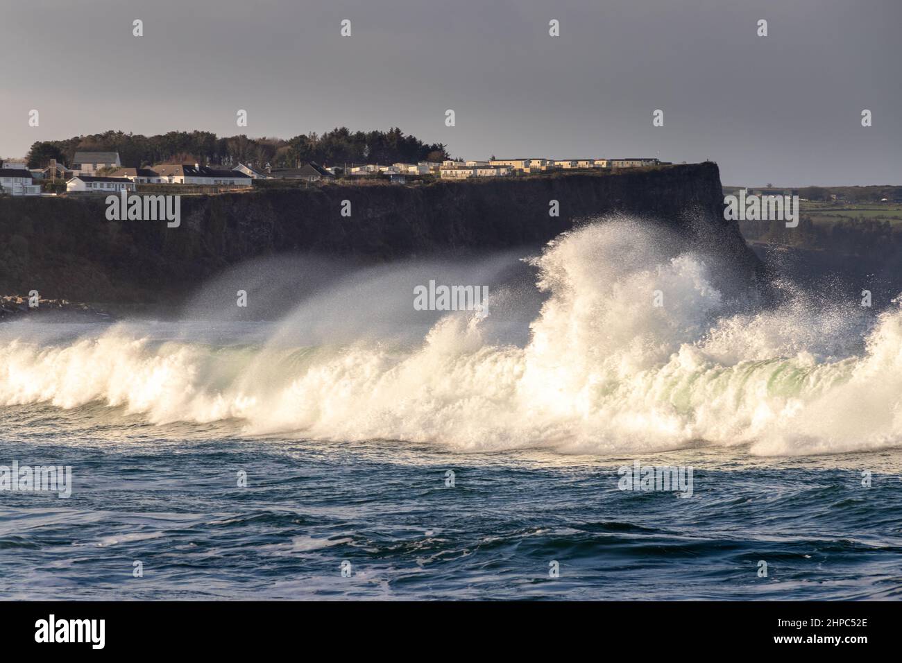 Surf's up in Ballycastle, County Antrim, Northern Ireland Stock Photo ...