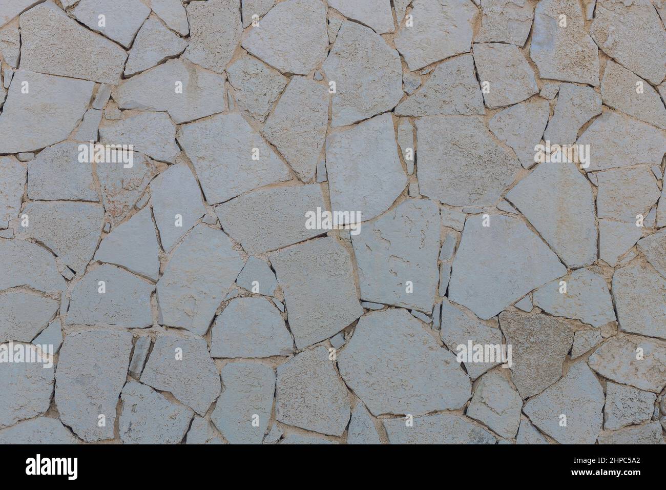 The texture of the stone wall. Background texture of the stone wall of ...
