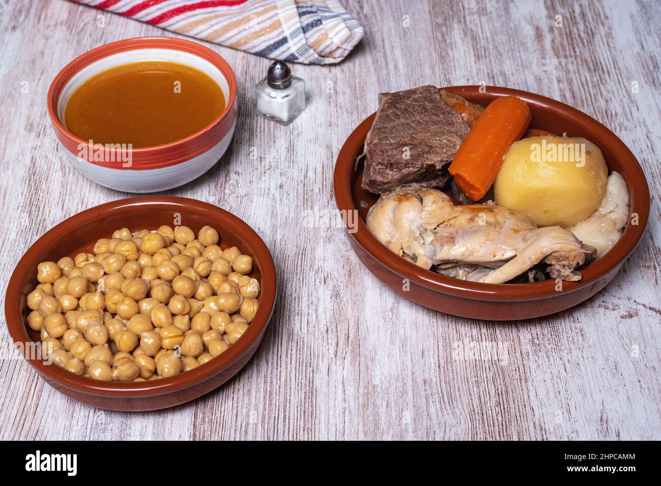 Cocido Madrileño, stew of chickpeas, vegetables, beef, chicken, chorizo ...