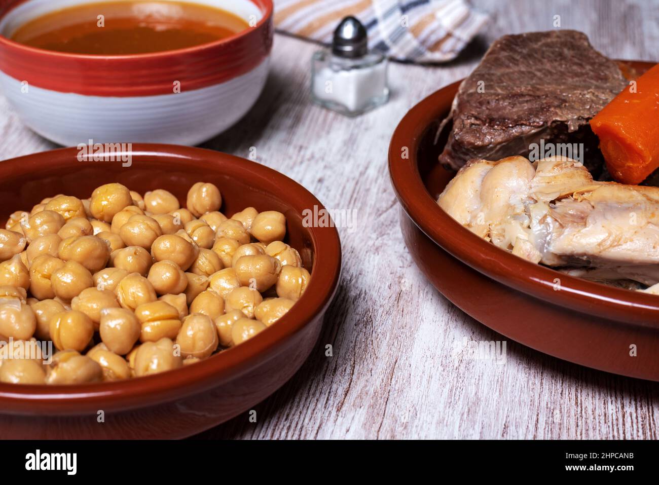 Cocido Madrileño, stew of chickpeas, vegetables, beef, chicken, chorizo ...