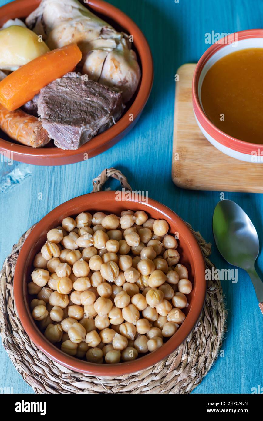 Cocido Madrileño, stew of chickpeas, vegetables, beef, chicken, chorizo ...