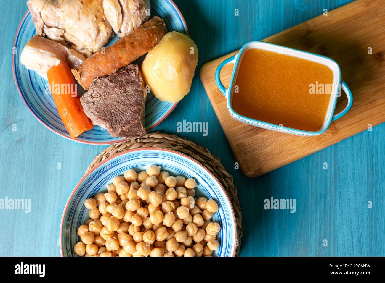 Cocido Madrileño, stew of chickpeas, vegetables, beef, chicken, chorizo ...