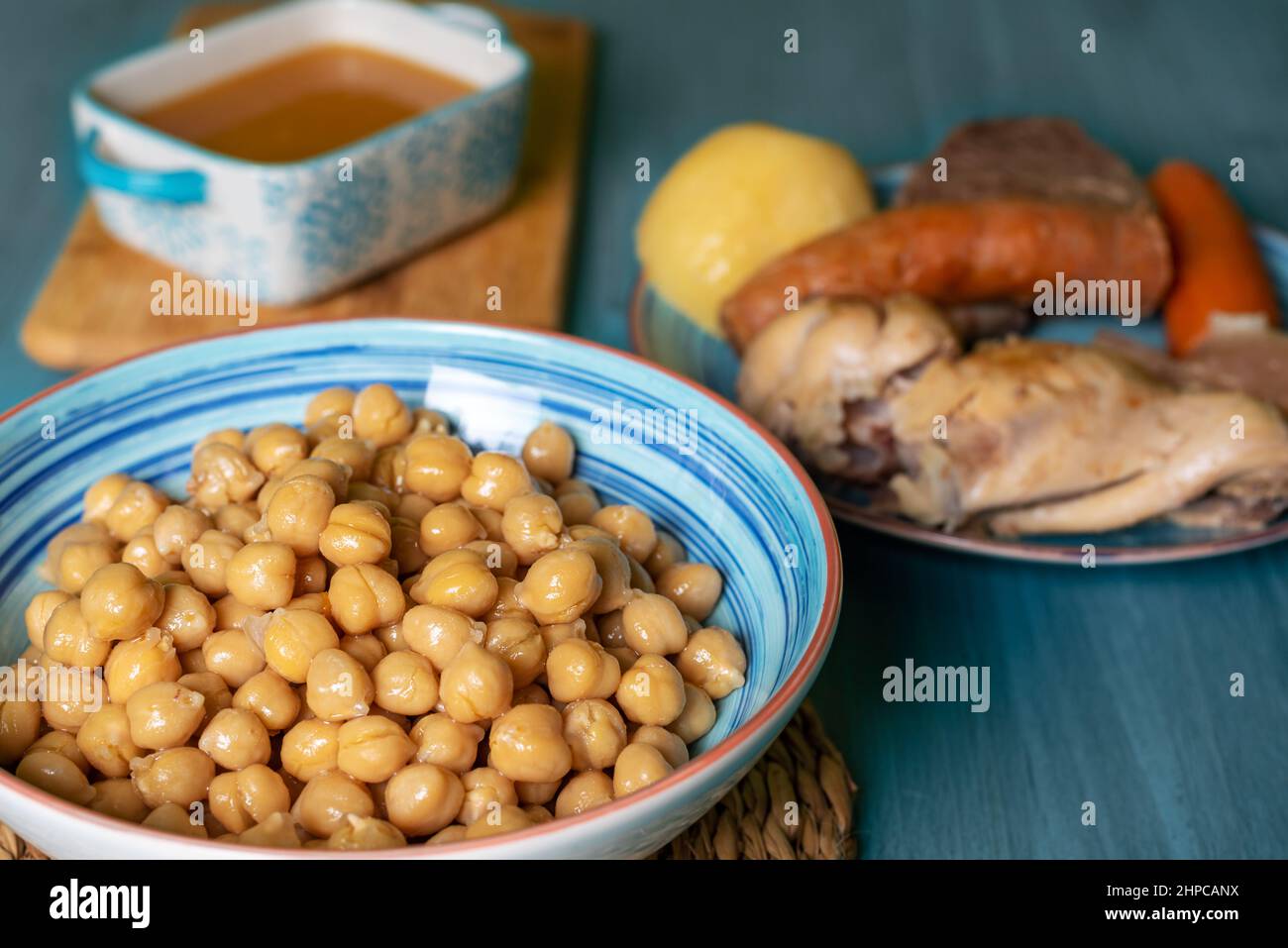 Cocido Madrileño, stew of chickpeas, vegetables, beef, chicken, chorizo ...