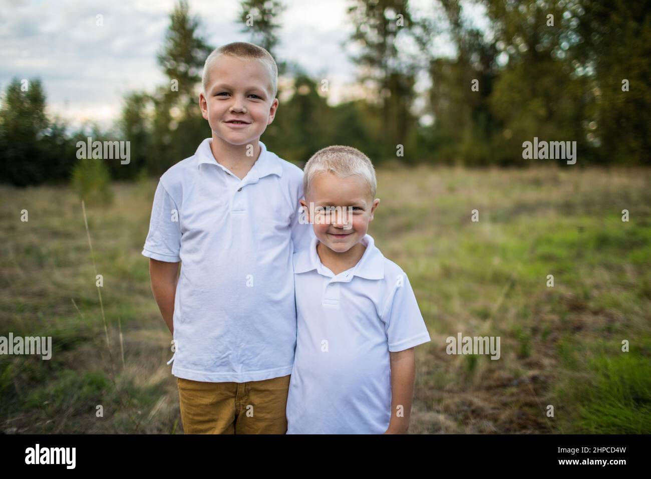 Older and younger brothers hi-res stock photography and images - Alamy