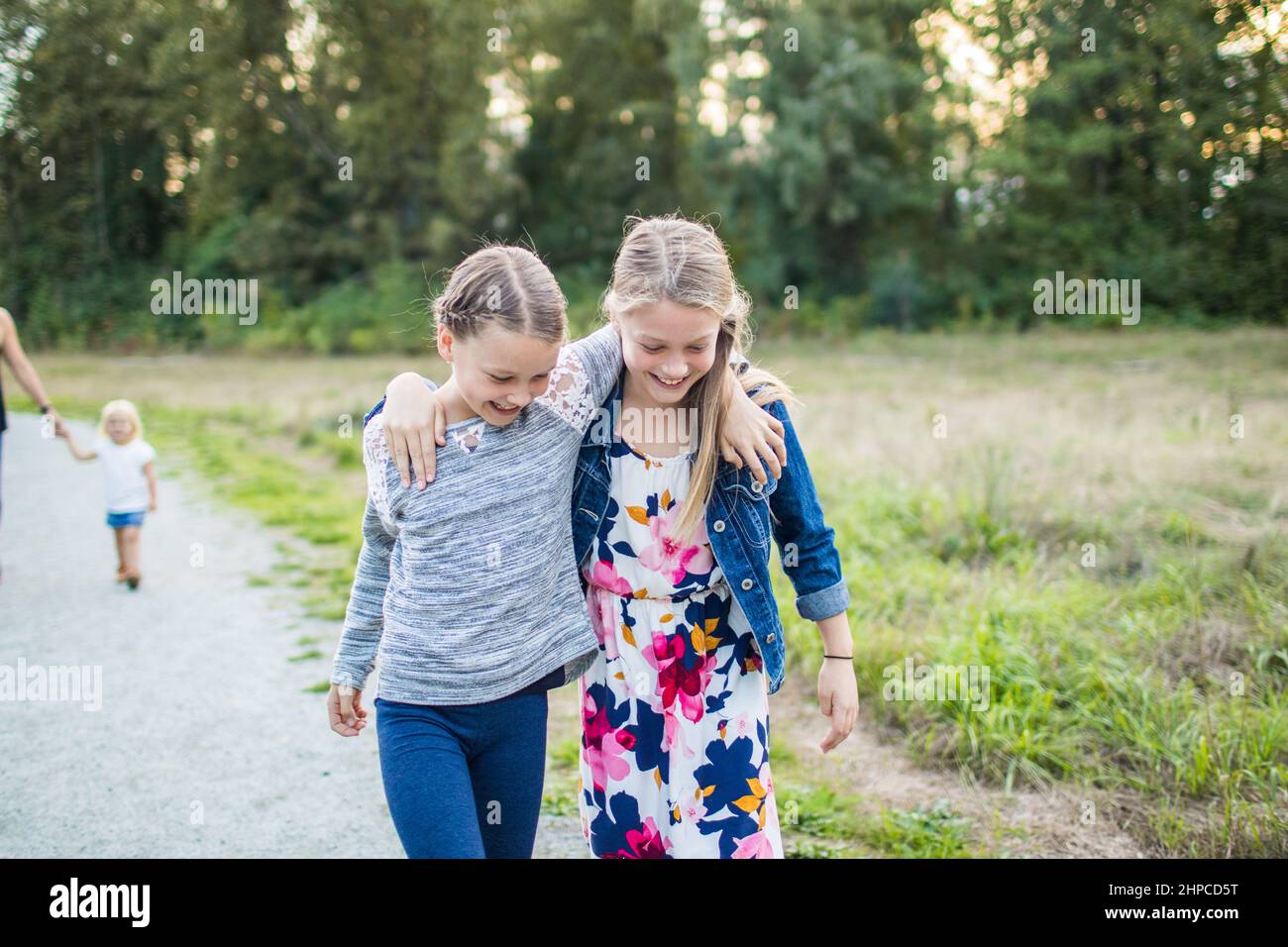Arms around smiling childhood fun hi-res stock photography and images ...