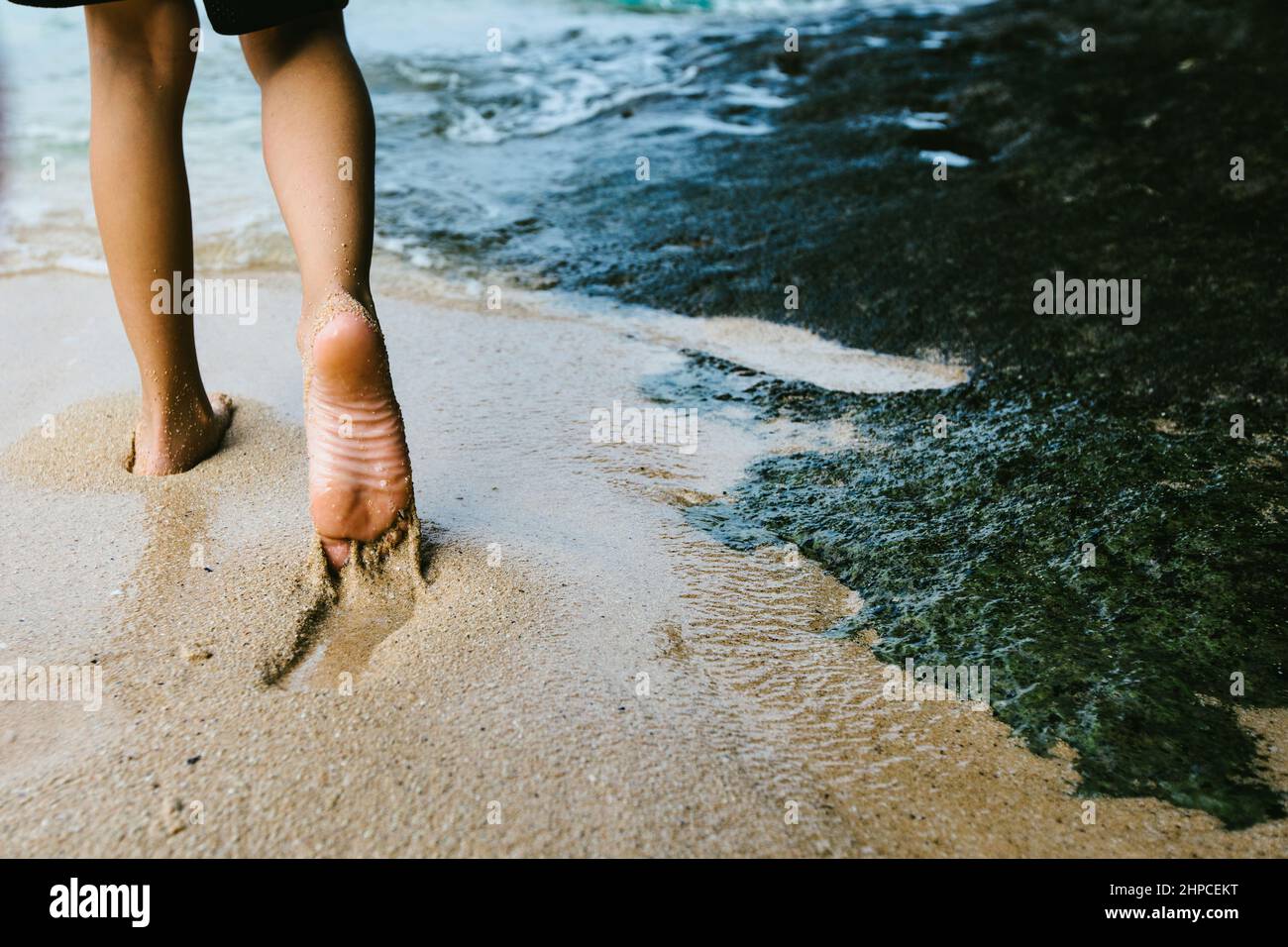 Kids feet beach tropical hi-res stock photography and images - Alamy