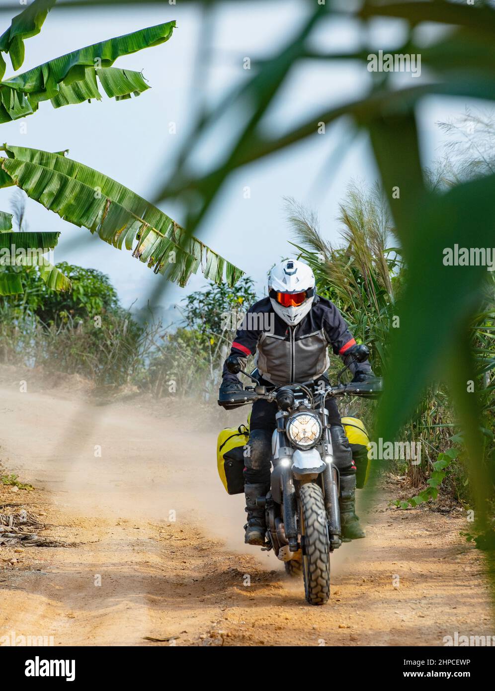 man riding his scrambler type motorcycle in north Thailand Stock Photo ...