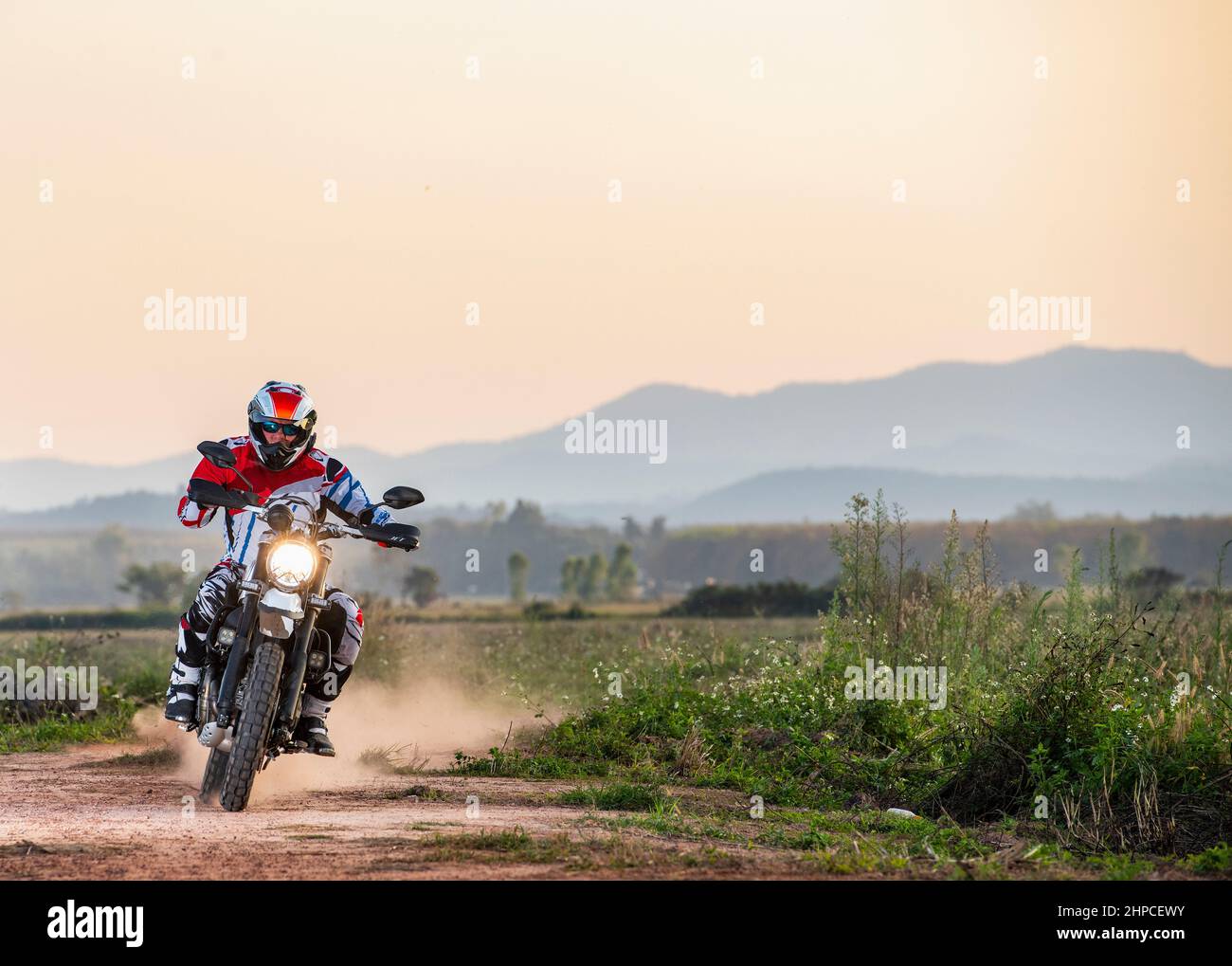 man riding his scrambler type motorcycle in north Thailand Stock Photo ...