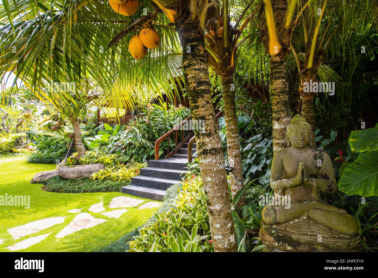 Buddha statue at luxury resort in Bali Stock Photo - Alamy