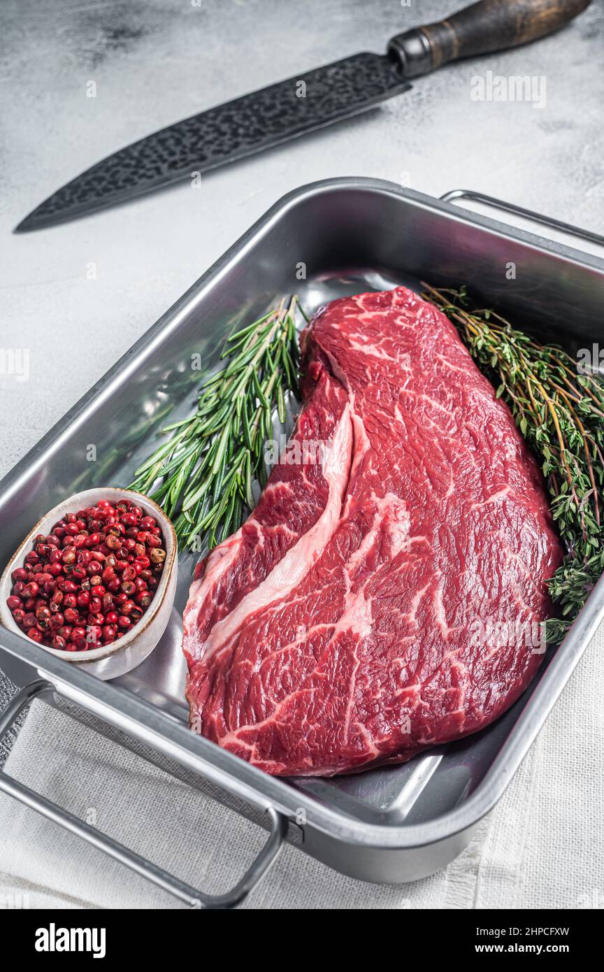 Butcher tray with raw top sirloin beef meat steak. White background ...
