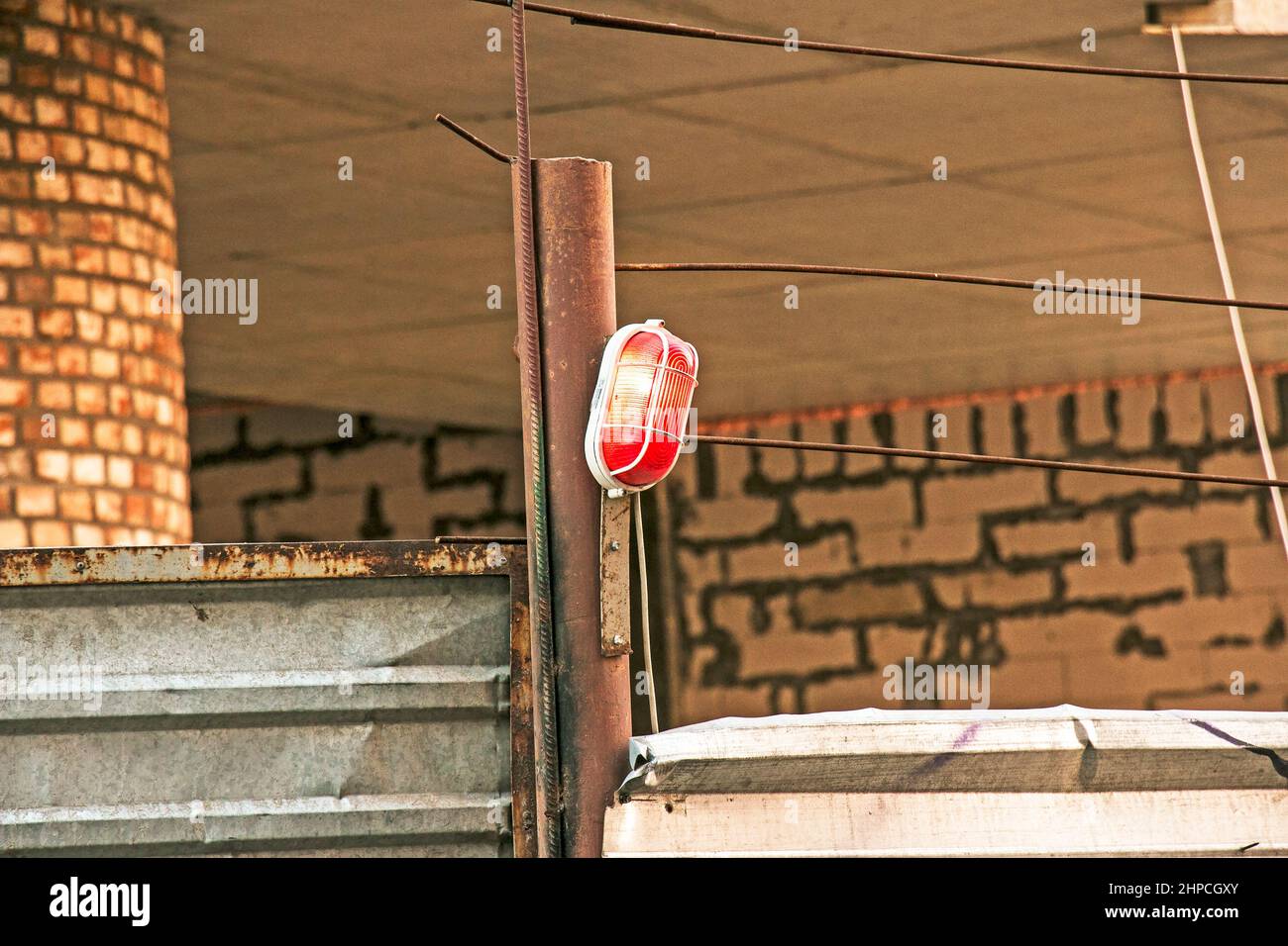 Warning red light on the gate to enter the construction site Stock ...