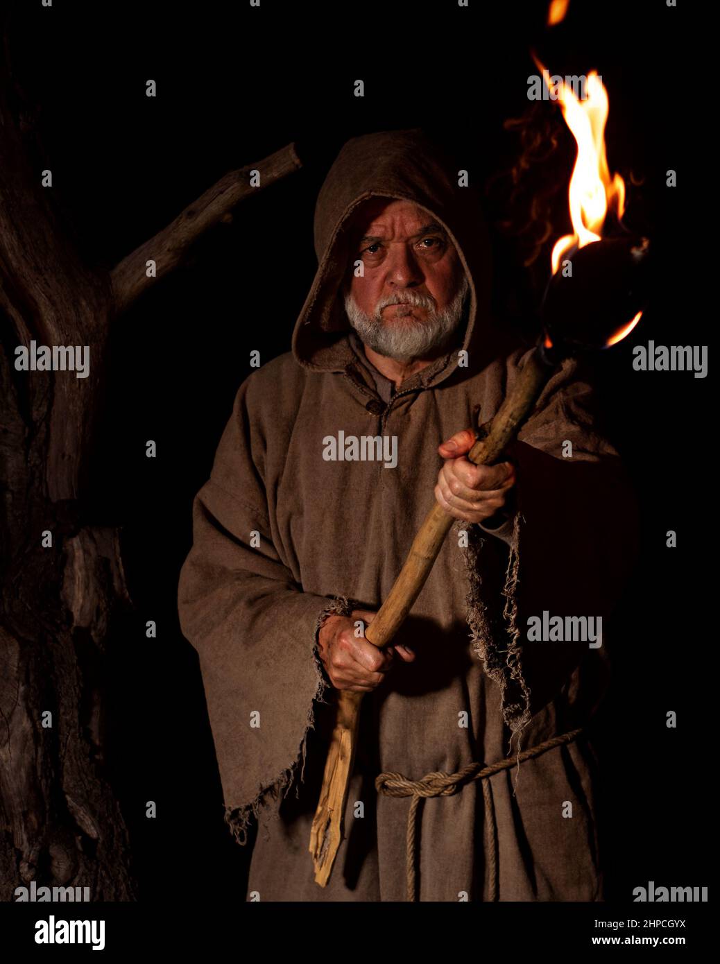 Angry poor farmer with torch in the middle ages Stock Photo - Alamy