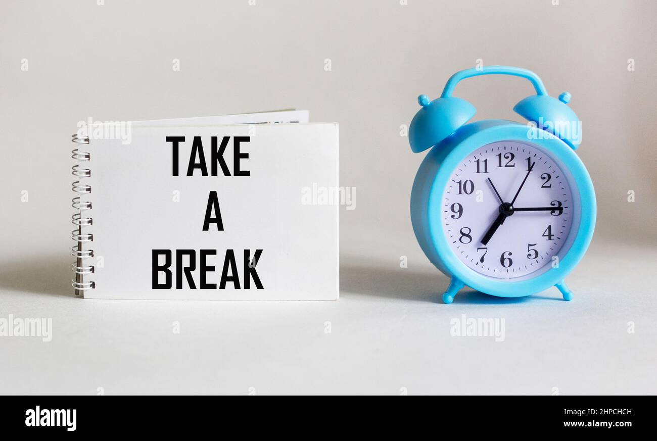 Take a break written in a notepad on a white background. business ...