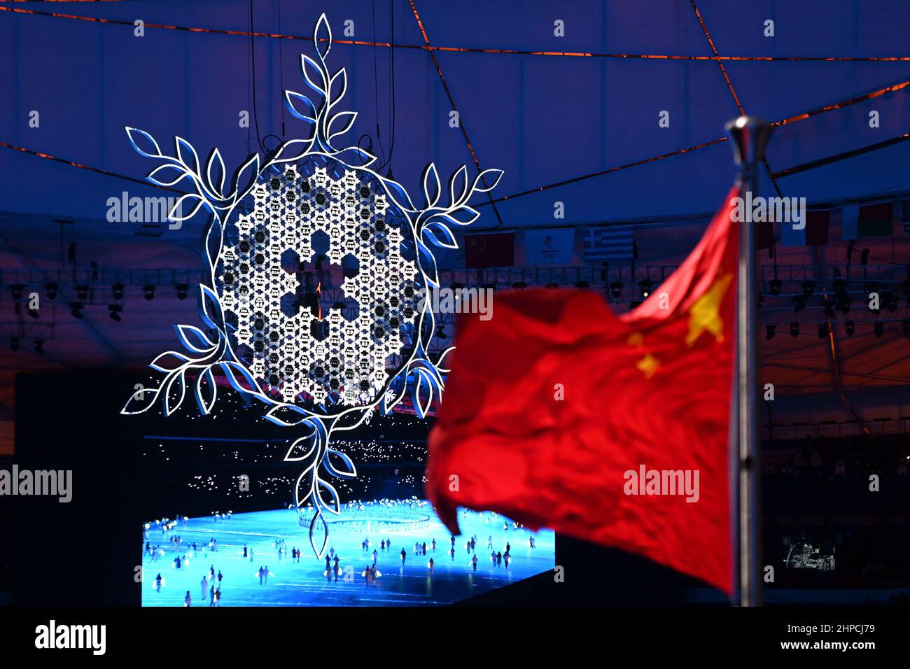 Beijing, China. 20th Feb, 2022. The Chinese national flag is raised ...