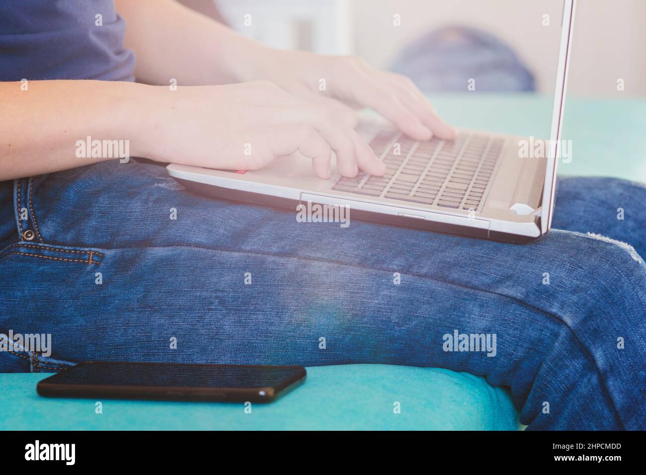 close-up. man with laptop.Guy with computer, Smartphone. side view ...