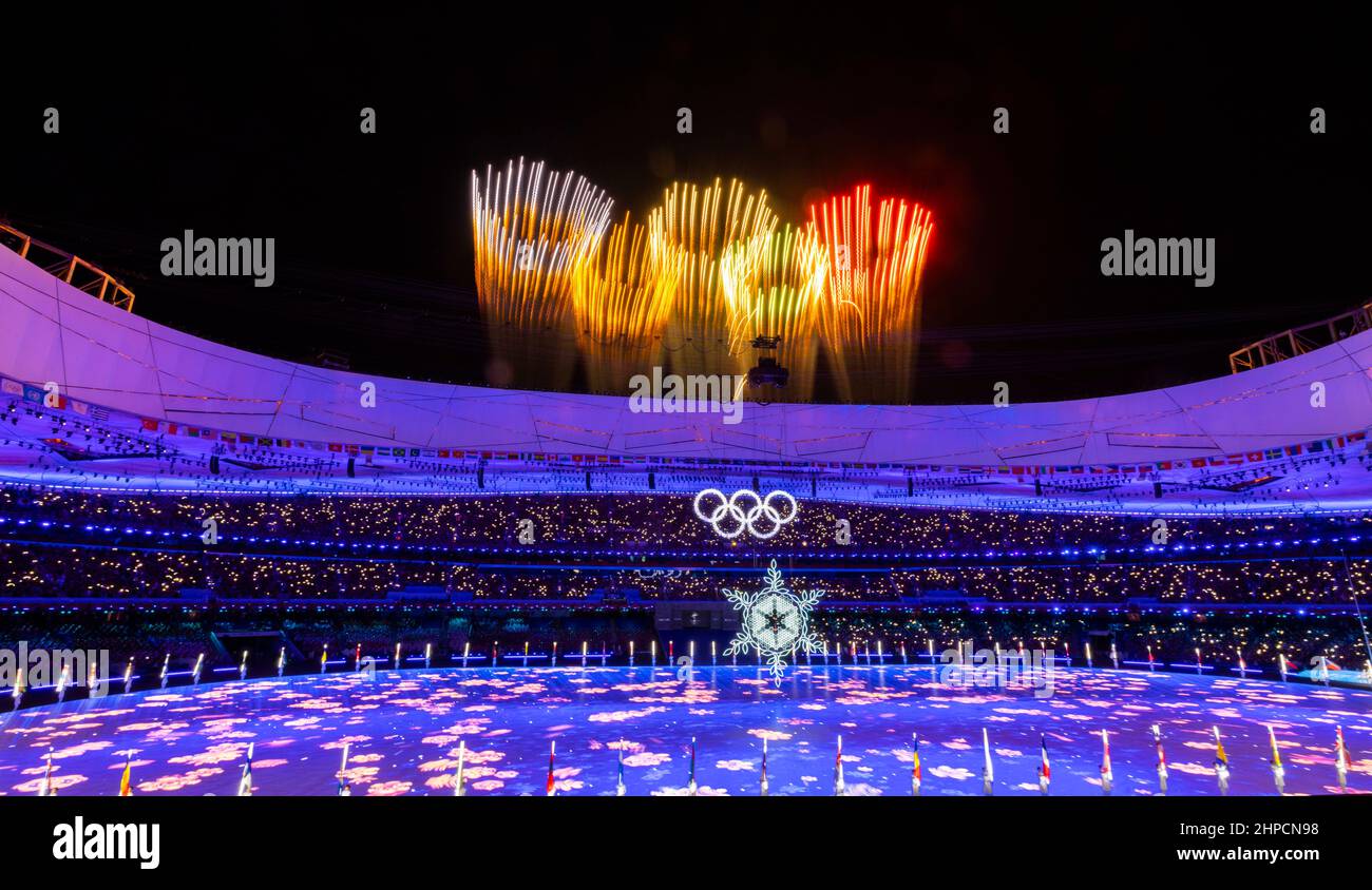 Beijing, China. 20th Feb, 2022. Fireworks illuminate the night sky ...