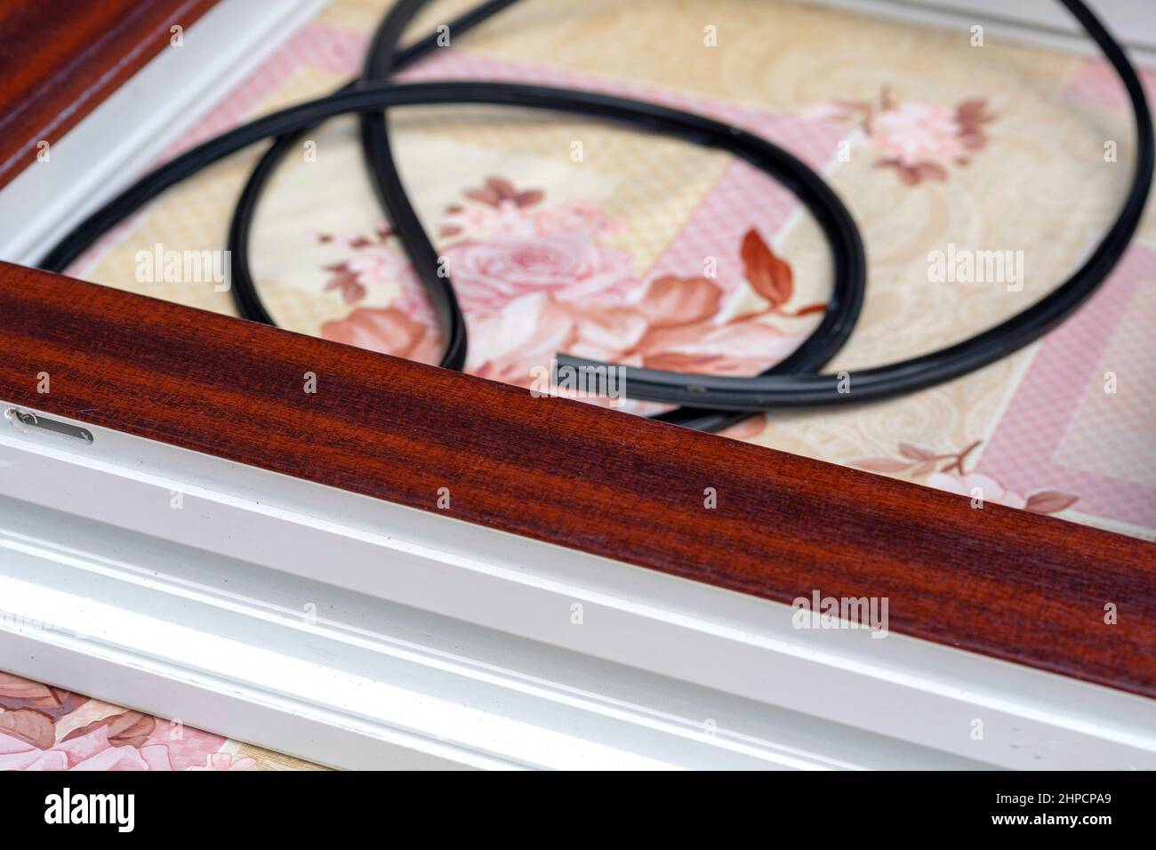 Applying rubber strip hi-res stock photography and images - Alamy