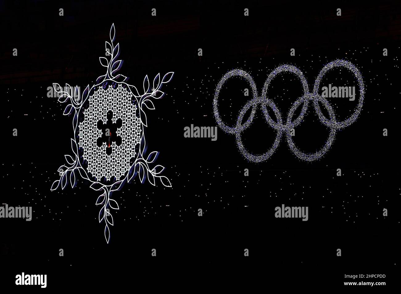 Beijing, China. 20th Feb, 2022. The rising Olympic rings pass by the ...