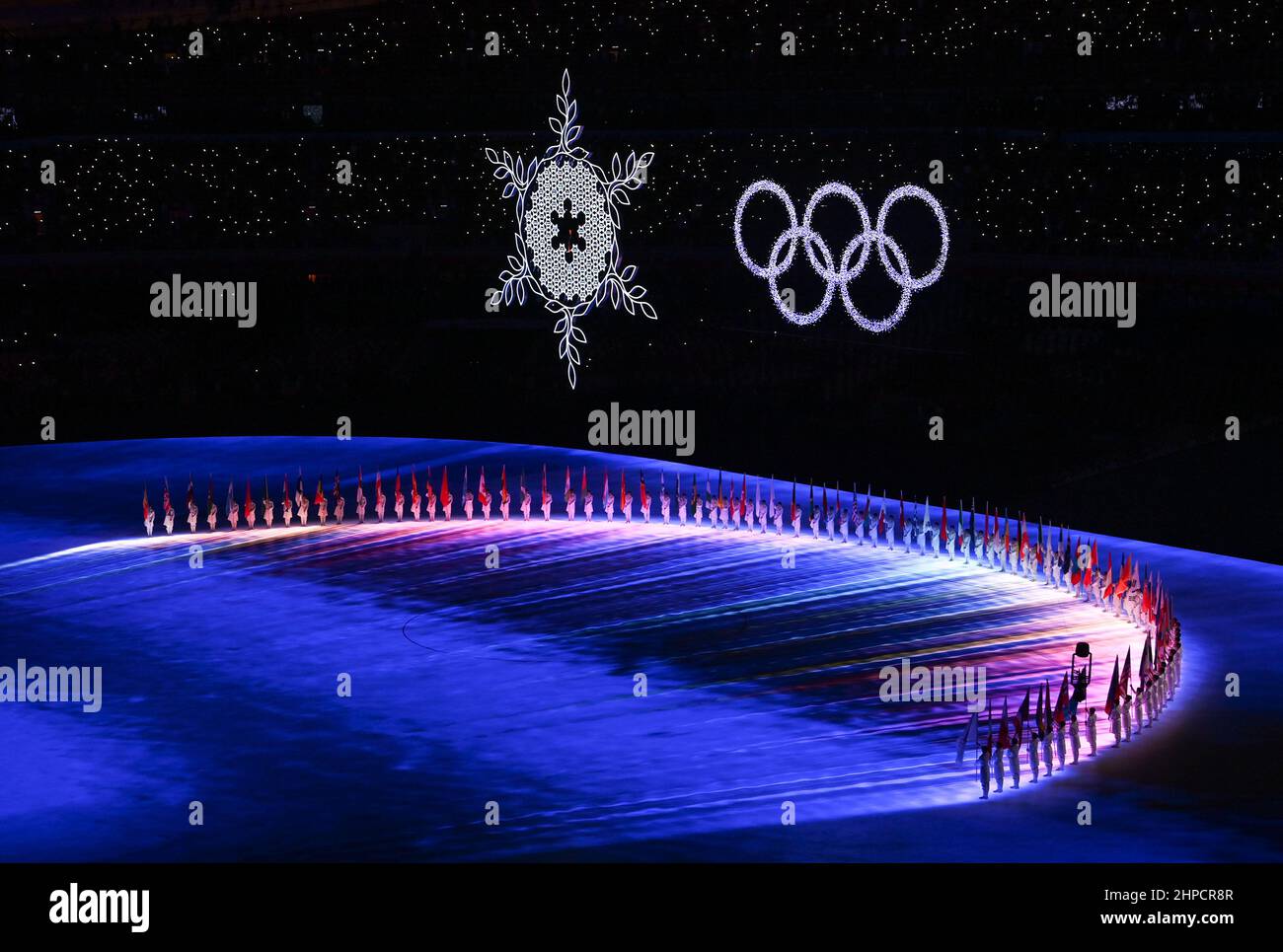 Beijing, China. 20th Feb, 2022. The rising Olympic rings pass by the ...