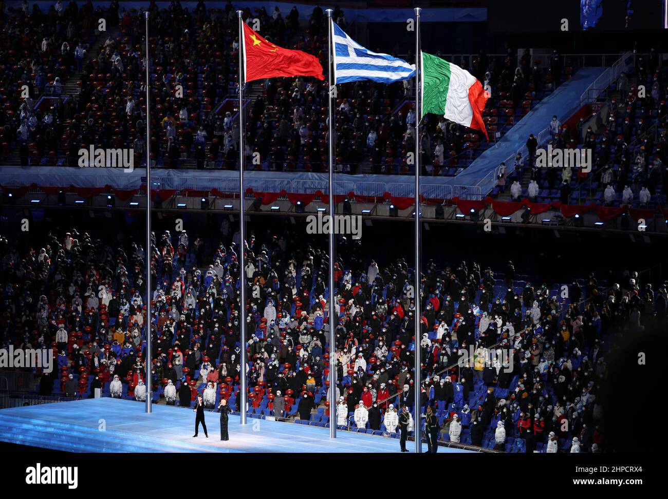 Beijing, China. 20th Feb, 2022. Italian contemporary pop singer Malika Ayane (bottom R) and ...
