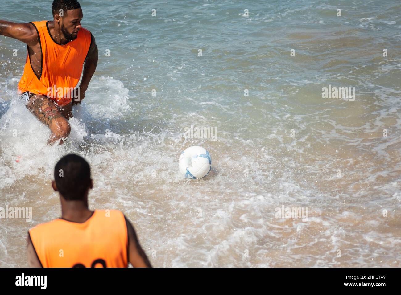 Salvador, Bahia, Brazil - August 15, 2021: People playing sand football ...