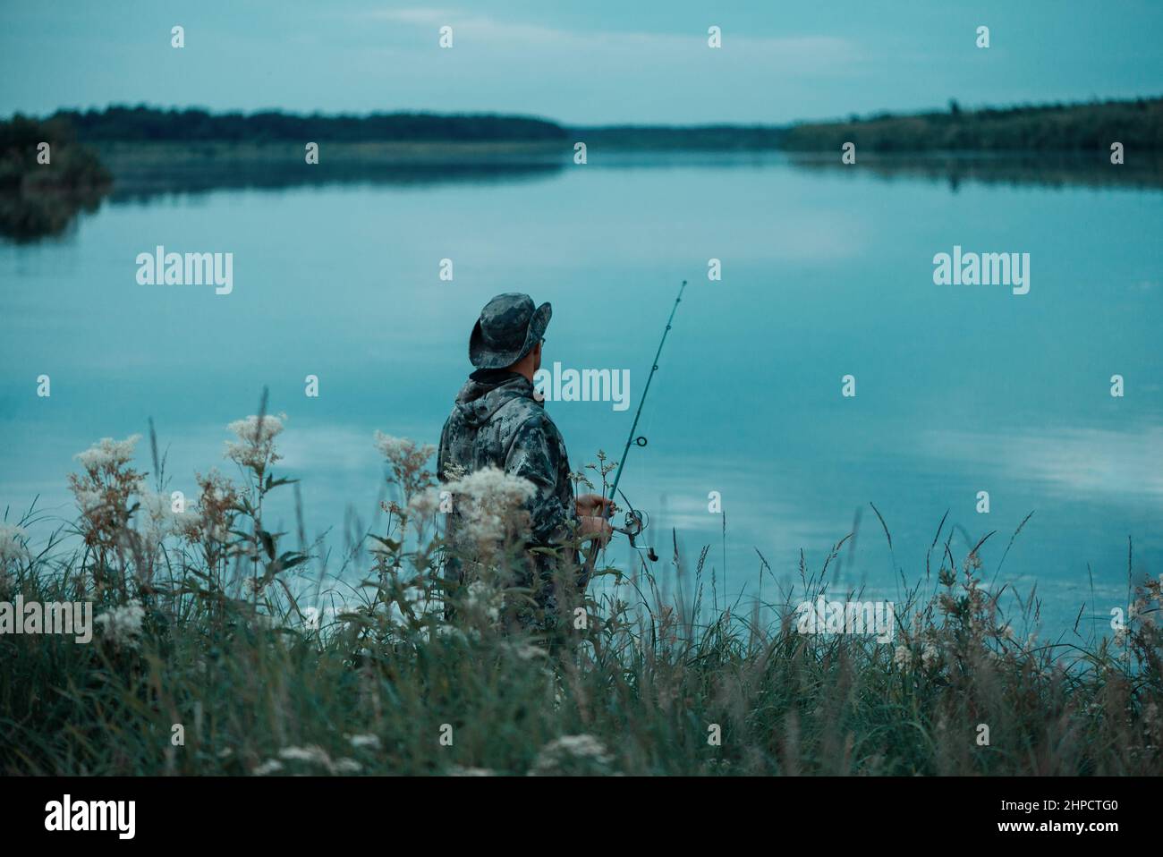 Old standing fisherman hi-res stock photography and images - Alamy
