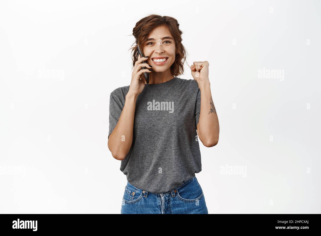 One smiling with clenched fist hi-res stock photography and images - Alamy