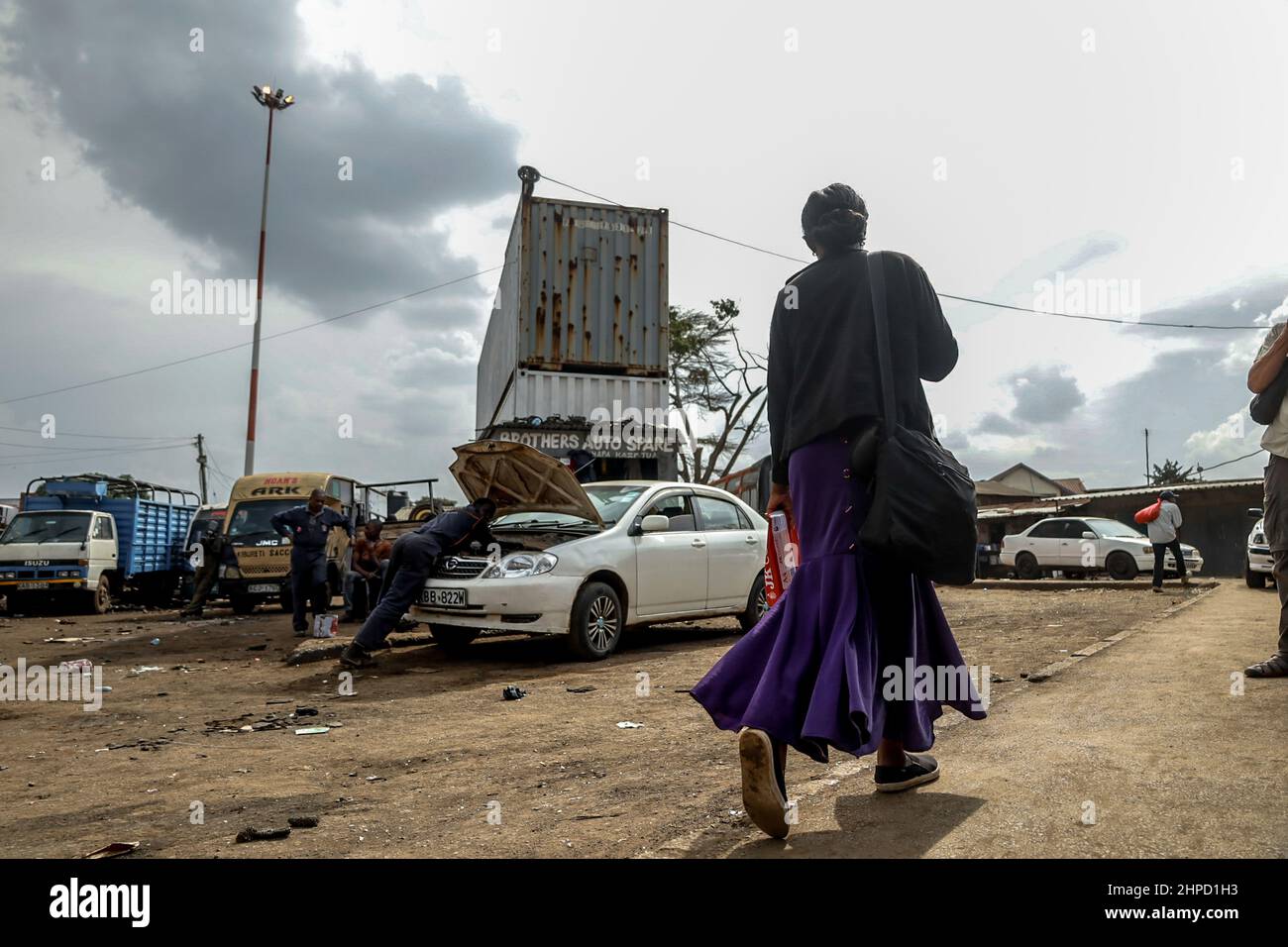 Mechanics work on broken vehiles at Kibera's old bus station formerly ...