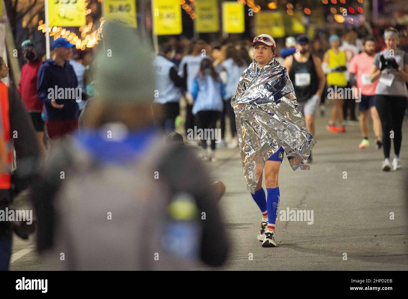 Austin, Texas. February 20, 2022: Runners keep warm before the start of ...