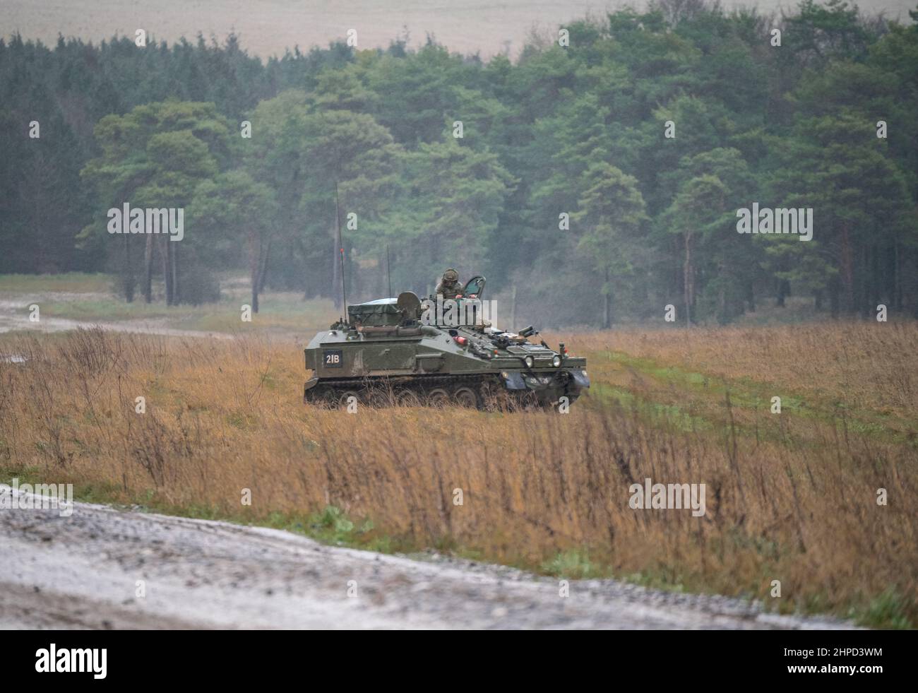 british army FV103 Spartan light armored vehicle in action on a ...