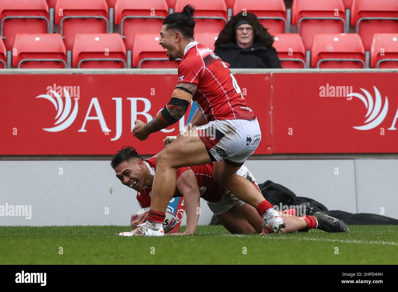 Ken Sio #2 of Salford Red Devils goes over for his second try of the ...