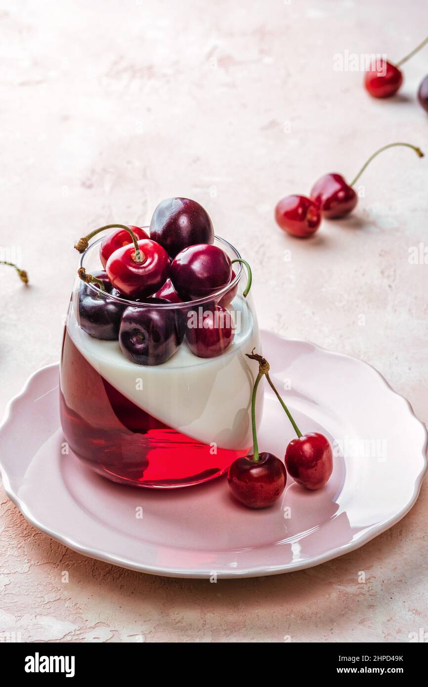 Delisious panna cotta summer dessert with cherries and cherry jelly ...