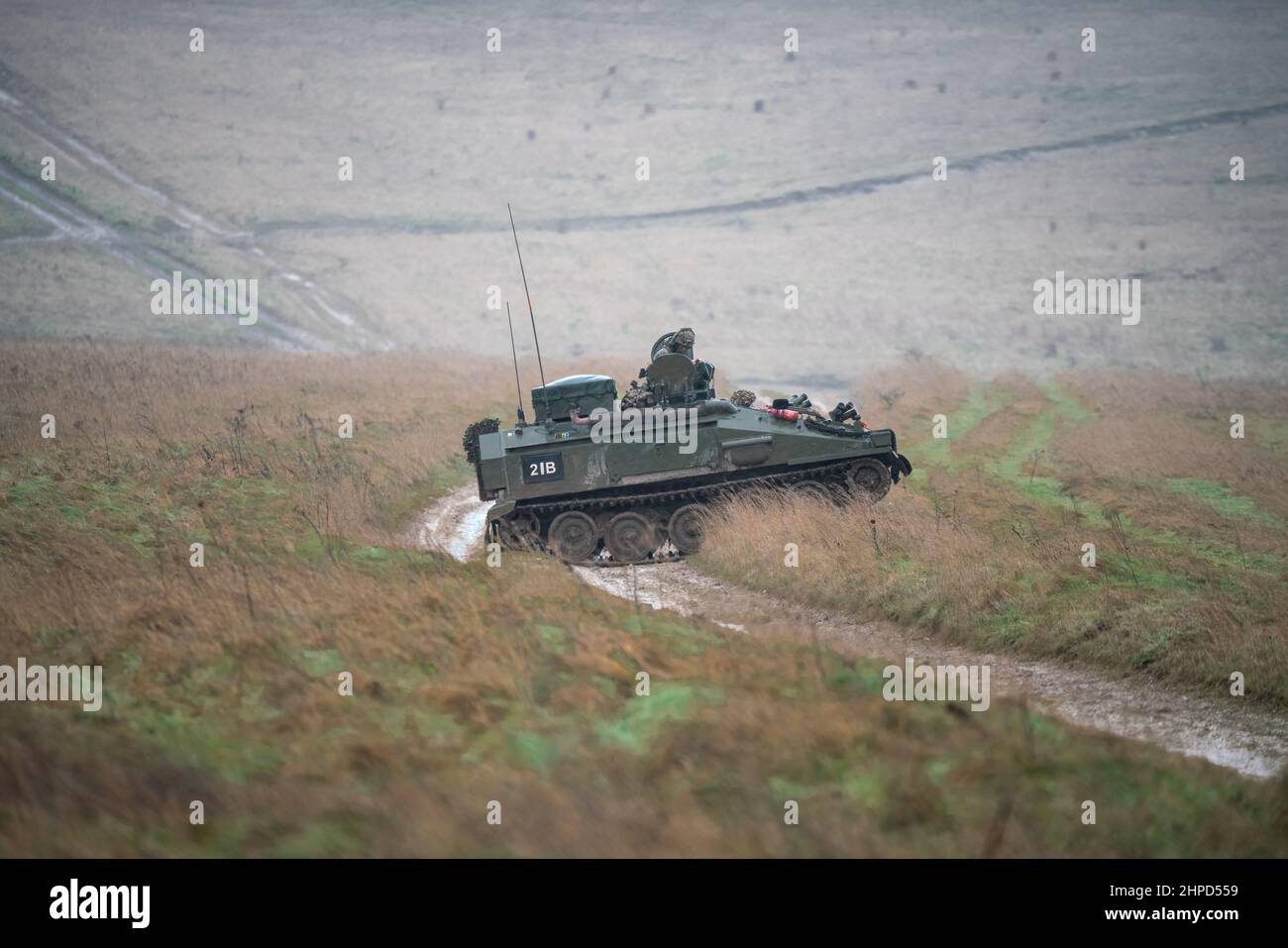 british army FV103 Spartan light armored vehicle in action on a ...