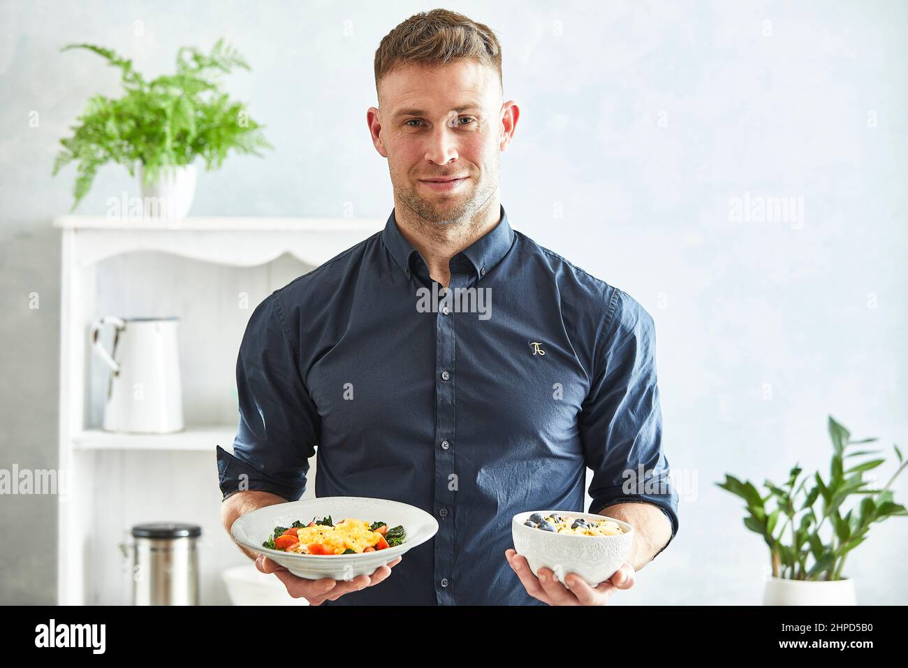 Man holding food hi-res stock photography and images - Alamy