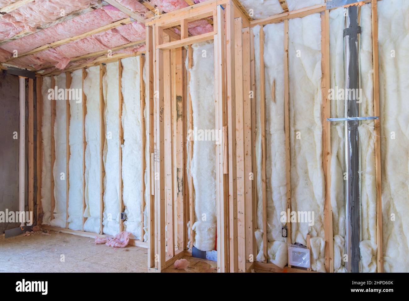 Wooden frame walls with insulated with rock wool fiberglass insulation ...