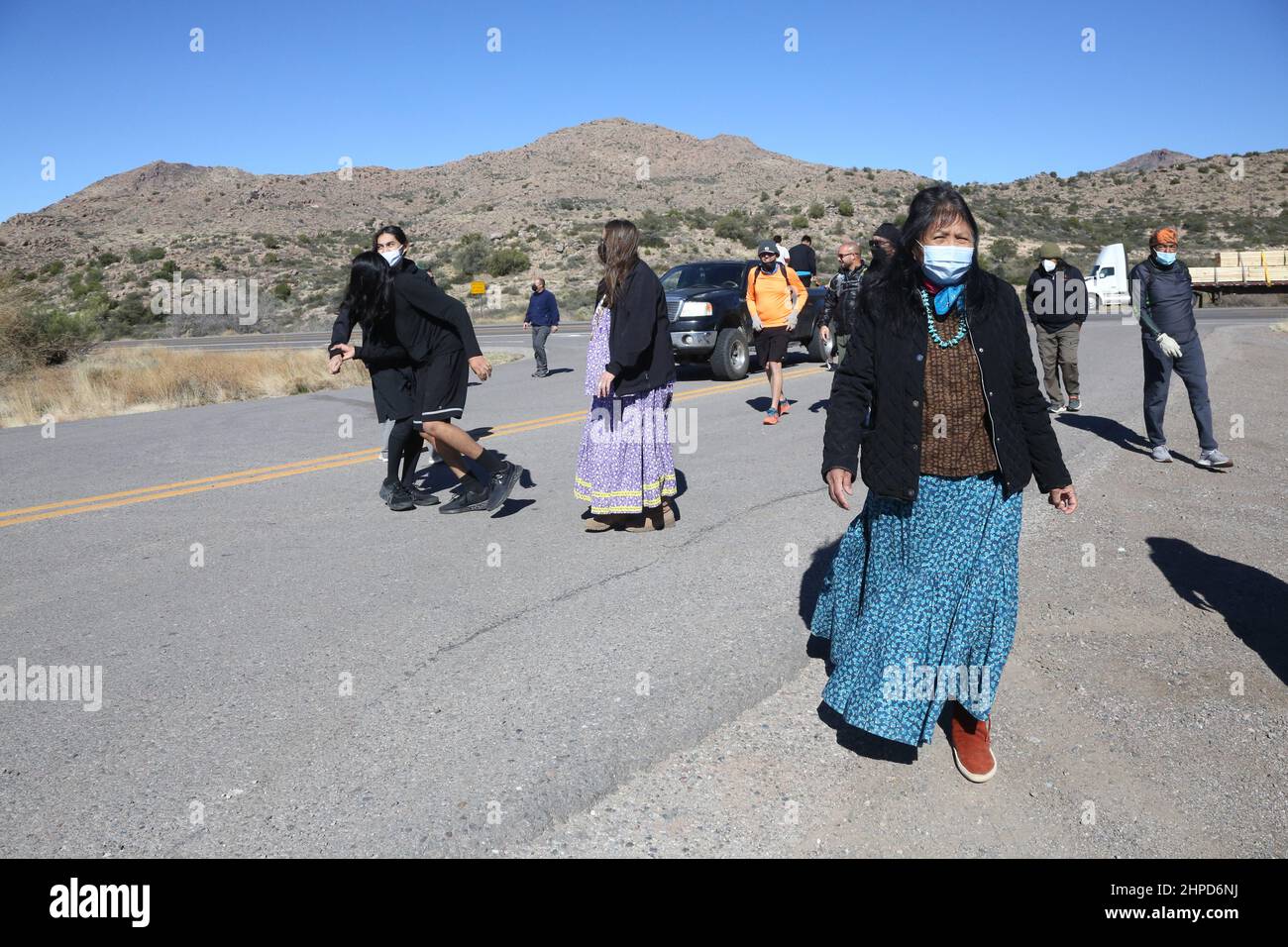Some members of Apache Stronghold and the San Carlos Apache Tribe wait at the entrance of the ...