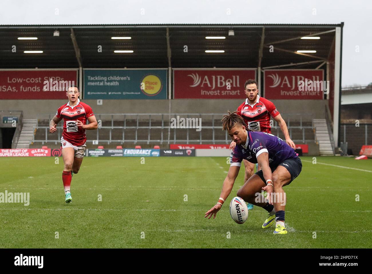 Guy Armitage #24 of Toulouse Olympique collects the ball as Joe Burgess ...