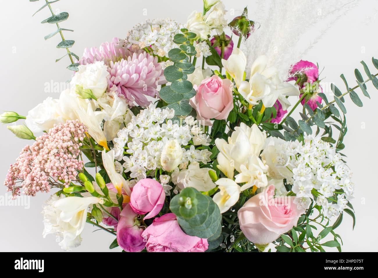 Bouquet of pastel colored flovers on white background Stock Photo - Alamy
