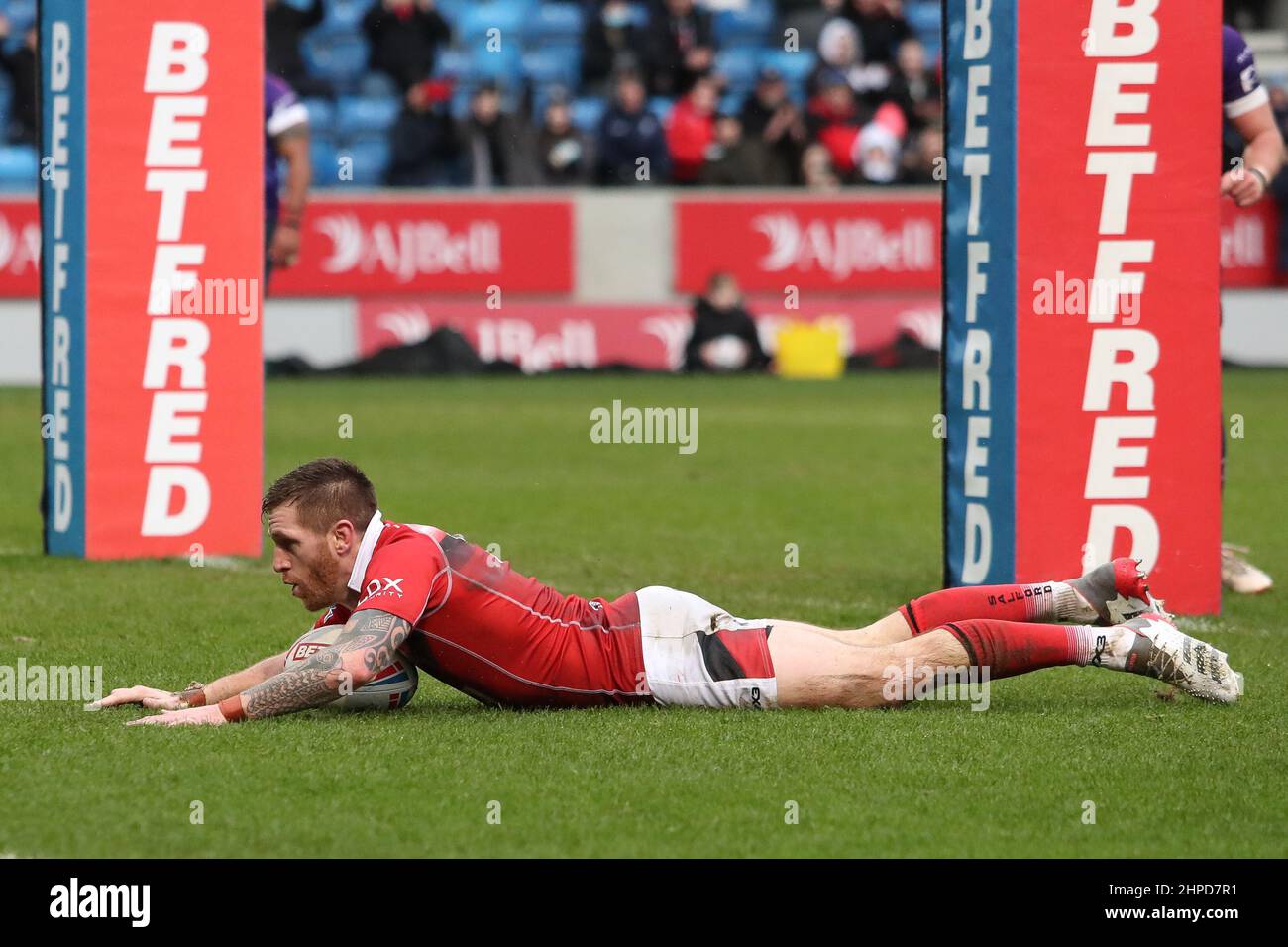 Marc Sneyd #7 of Salford Red Devils goes over for a try in the first ...