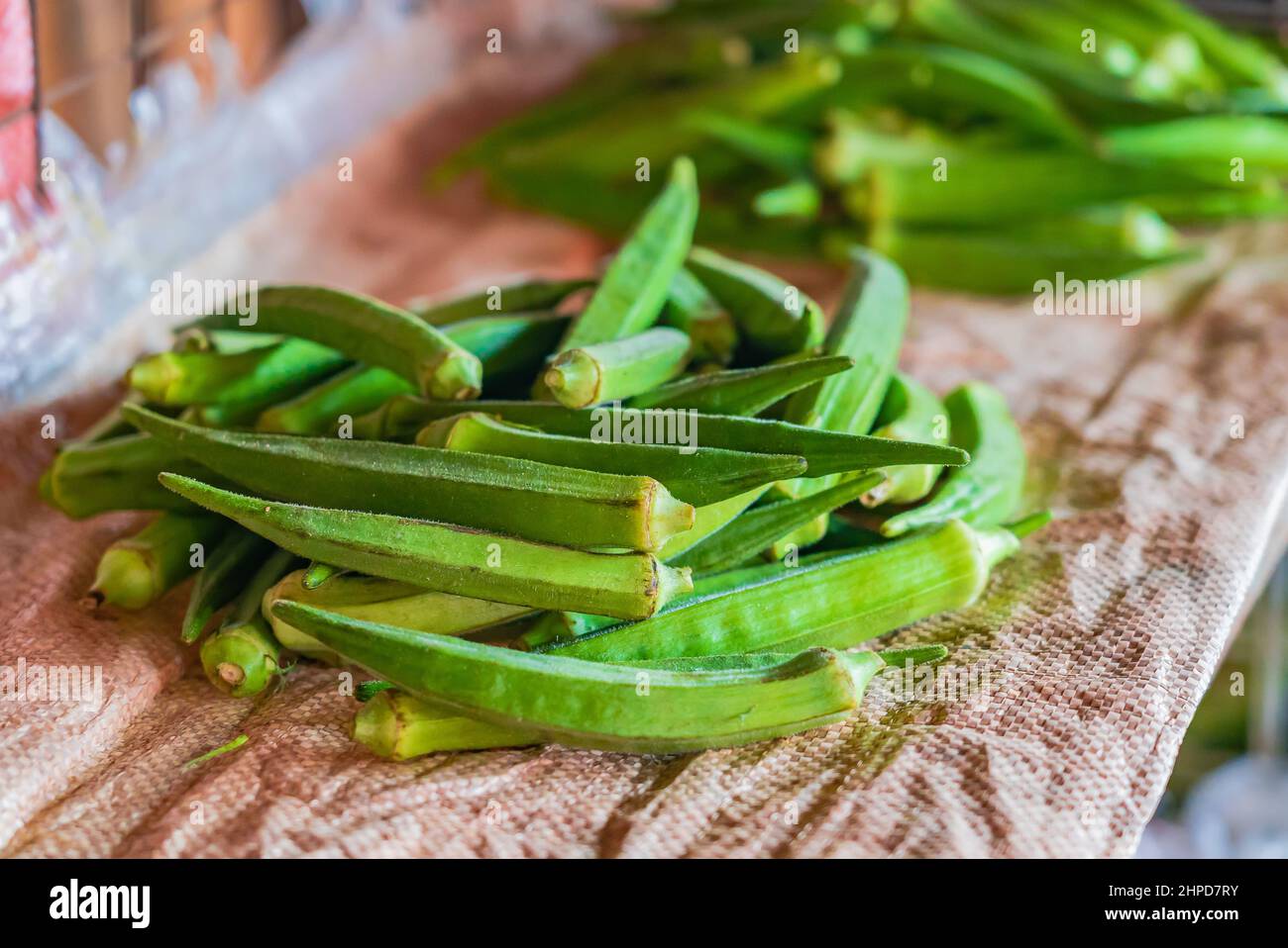 Fresh okra on the counter of food market in Zanzibar, Tanzania Stock ...